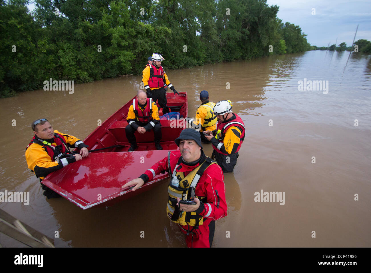 Texas Task Force 1 Urban Search and Rescue and boat crew members work ...