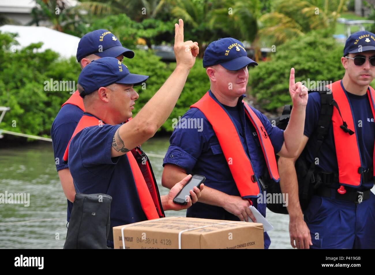 Coast Guard Chief Petty Officers Justin Pickler and Des Bowen calculate ...