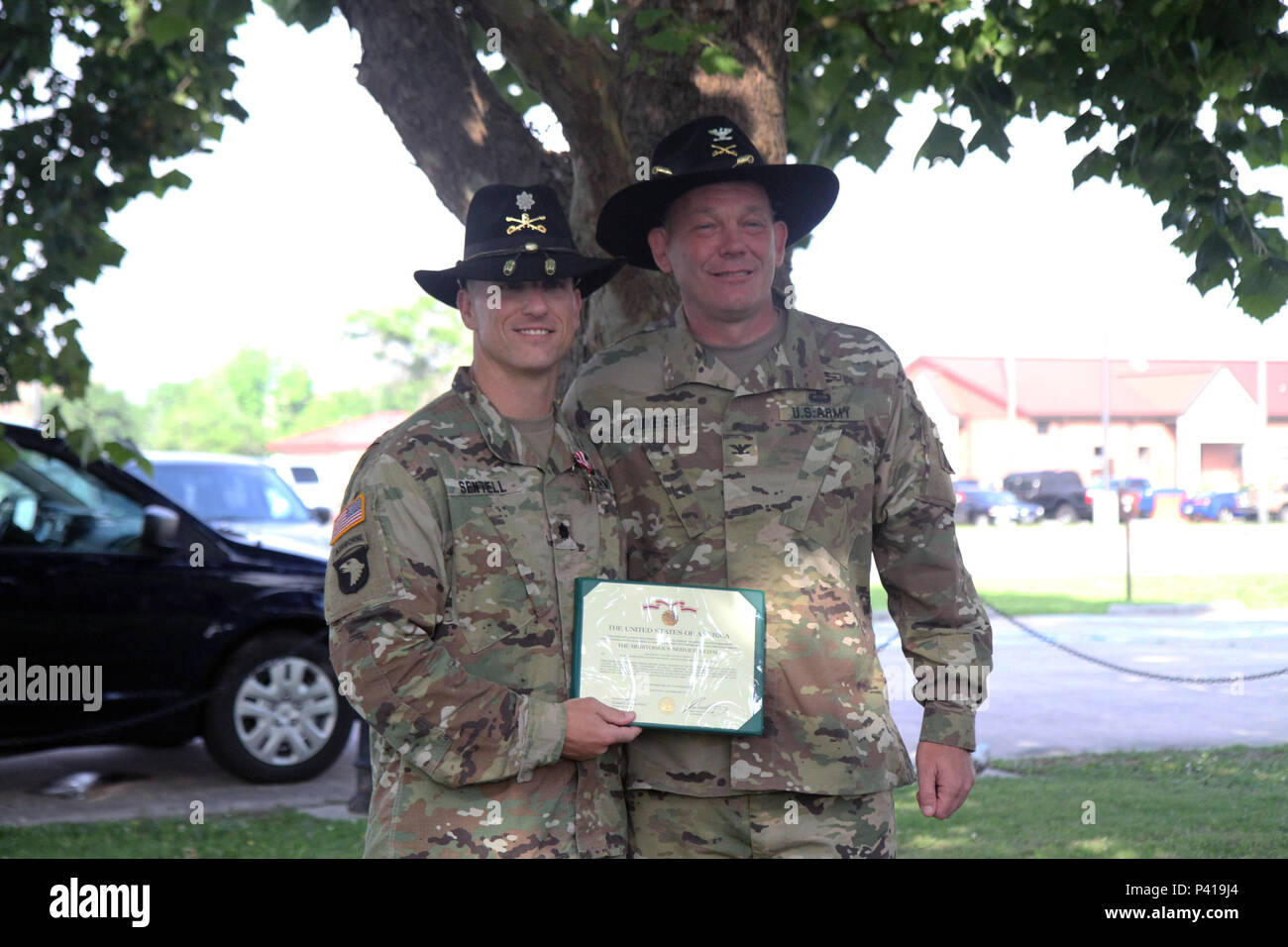 Lt. Col. Scott Sentell (left), outgoing commander of 6th Squadron, 8th ...