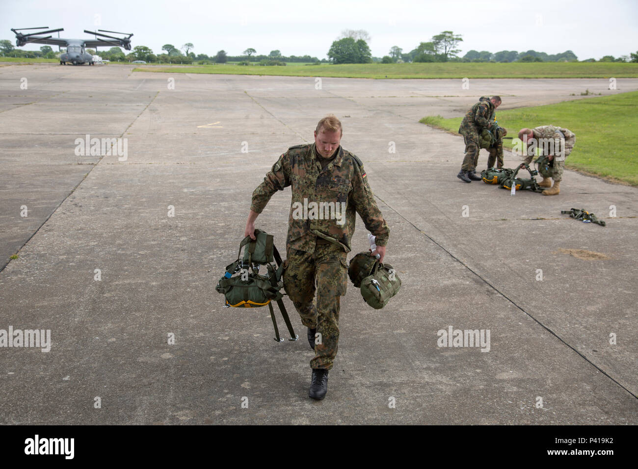 A German jumpmaster walks to a C-160 Transall during airborne ...