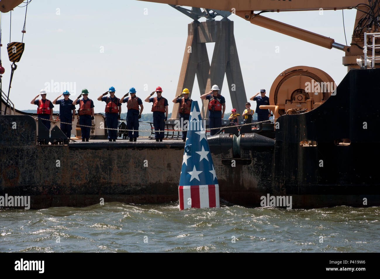 Crewmembers aboard Coast Guard Cutter James Rankin render a salute ...