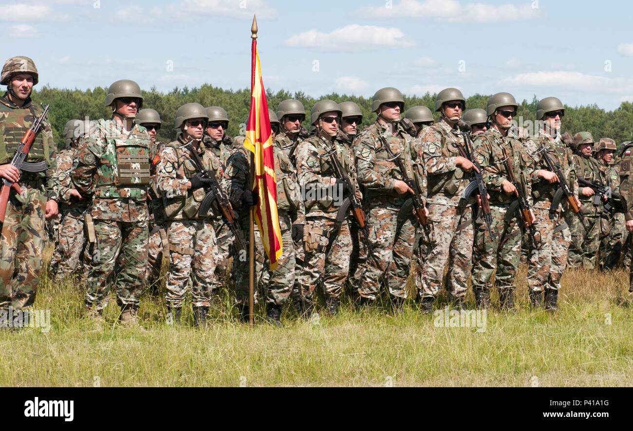 Macedonian soldiers stand in formation during the opening ceremony for ...
