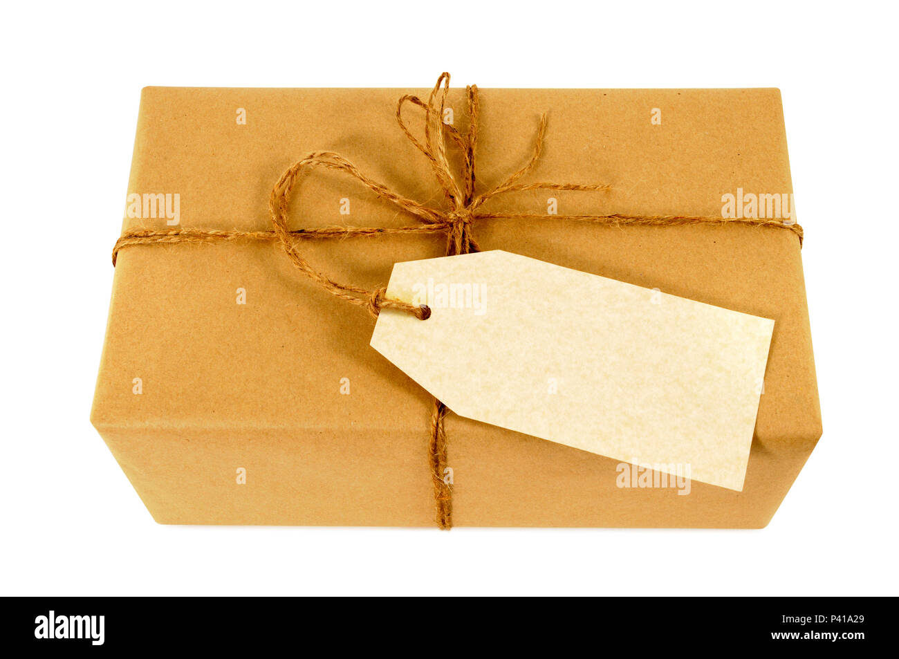 Brown paper package tied with string Stock Photo - Alamy