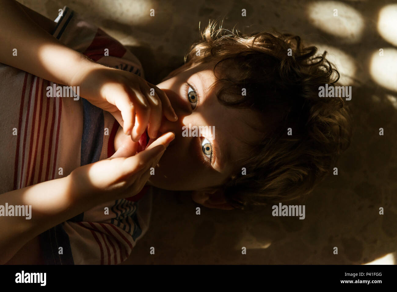 Shading her face hi-res stock photography and images - Alamy