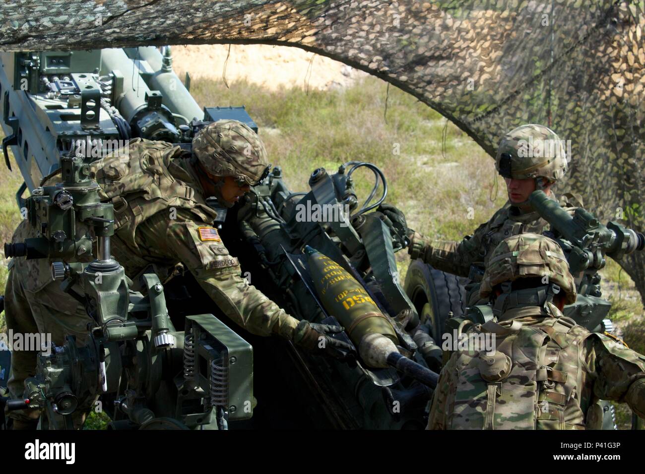 Pfc. Mark Verdugo (left) and Pfc. Aaron Miller (right), both cannon ...