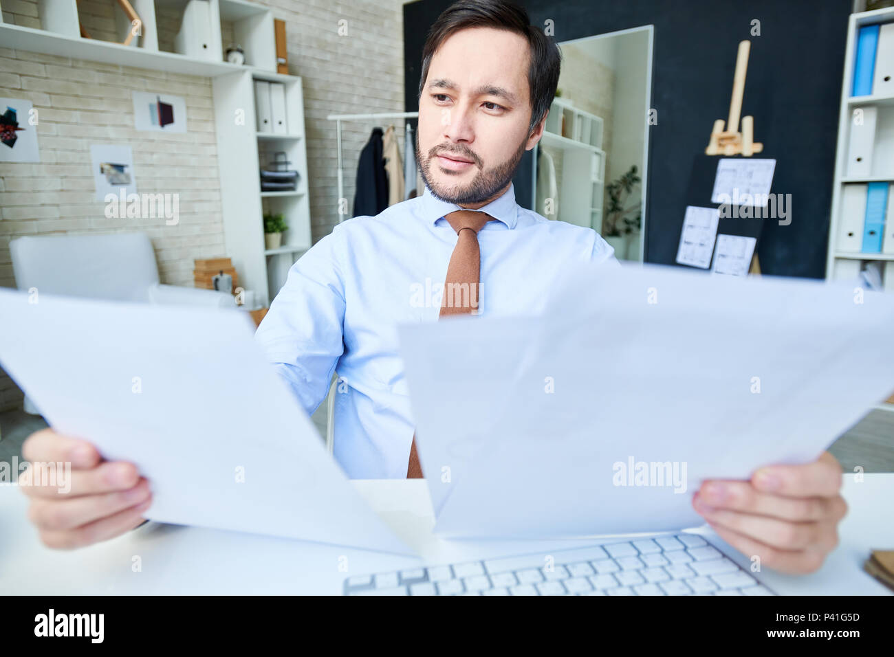Desk papers man hi-res stock photography and images - Alamy