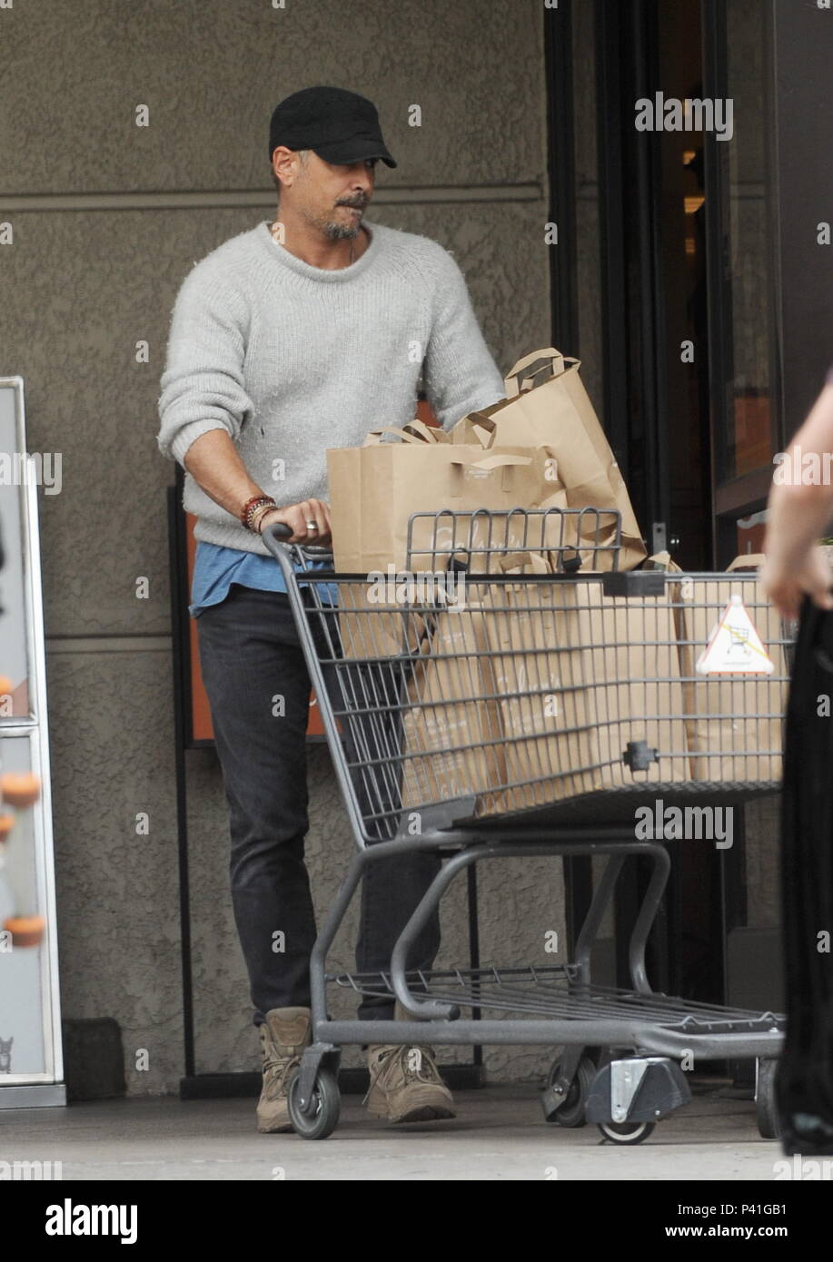 Colin Farrell out and about after checking into rehab last month ...