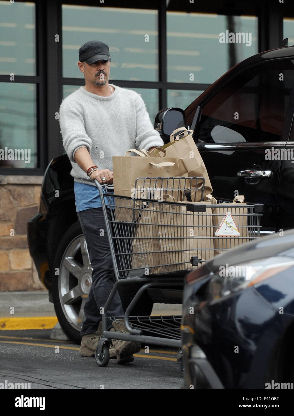 Colin Farrell out and about after checking into rehab last month ...
