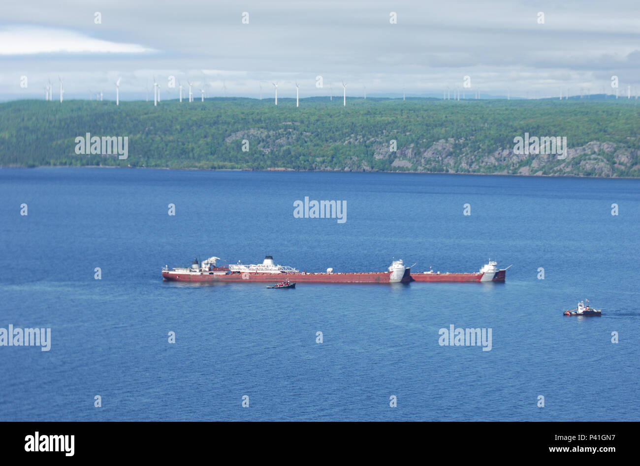 The motor vessel Phillip R. Clarke arrives on scene with the motor ...