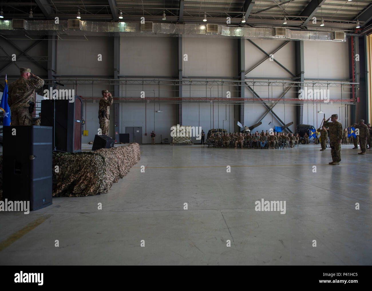 Brig. Gen. James Sears, 455th Air Expeditionary Wing commander, renders ...