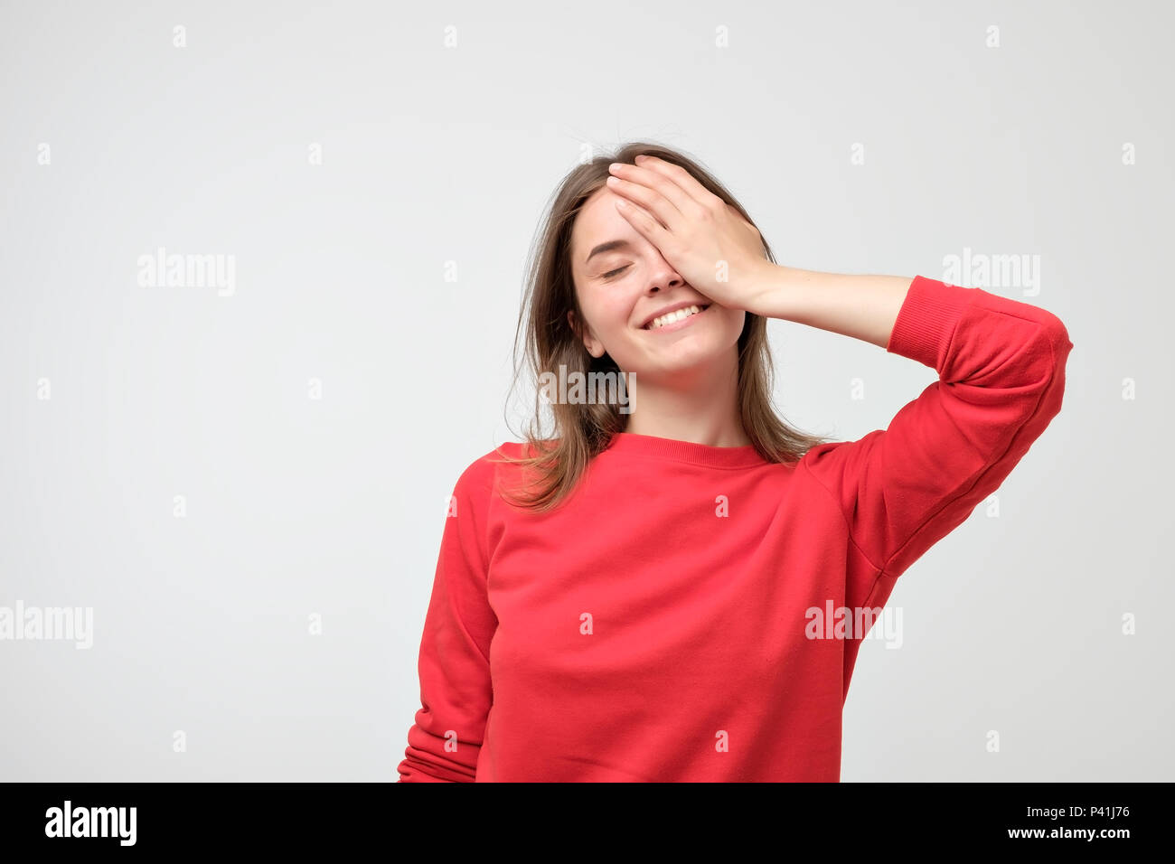Female hand resting on cheek hi-res stock photography and images - Alamy