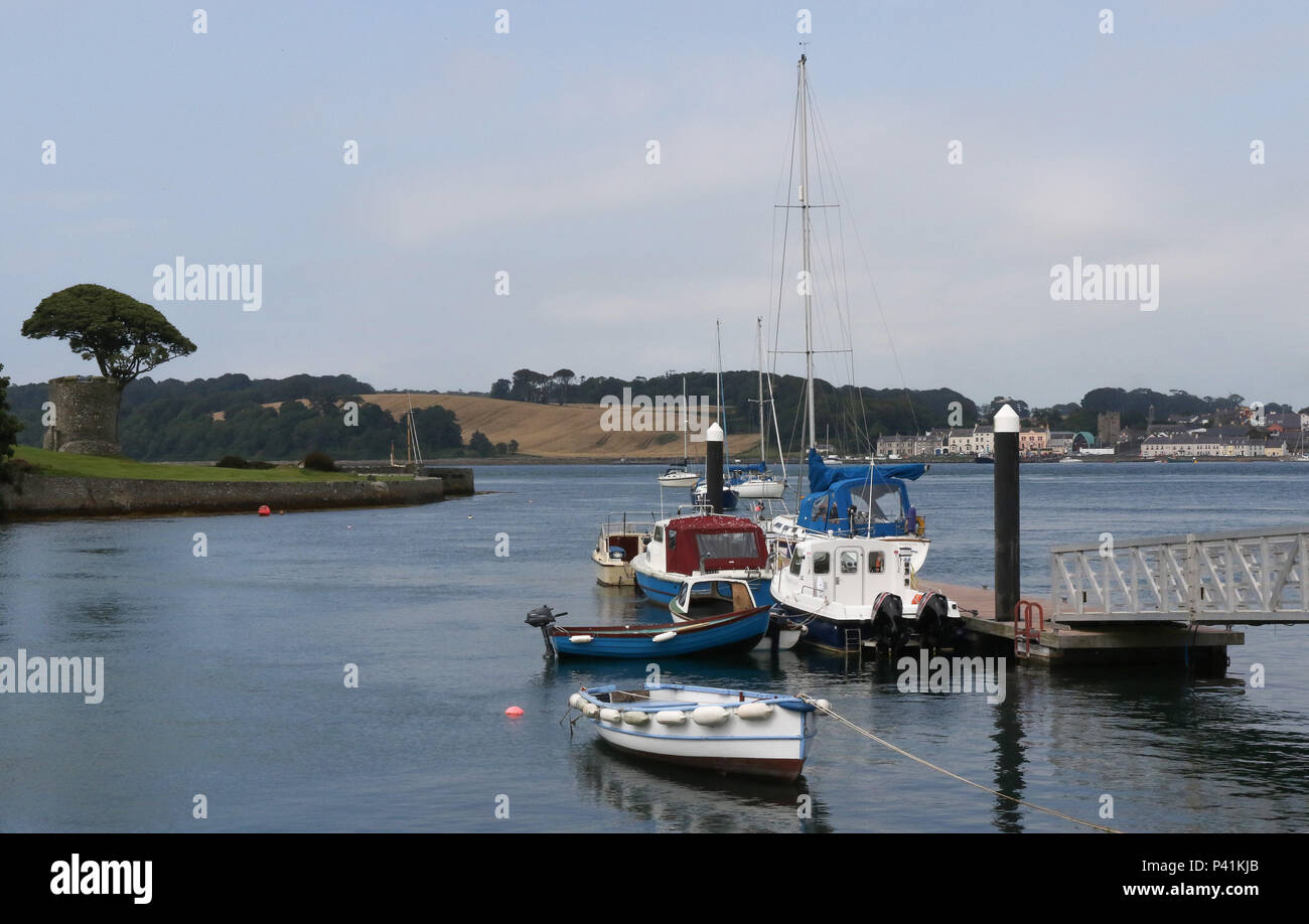 Boats in the habour at Strangford County Down with the village of ...