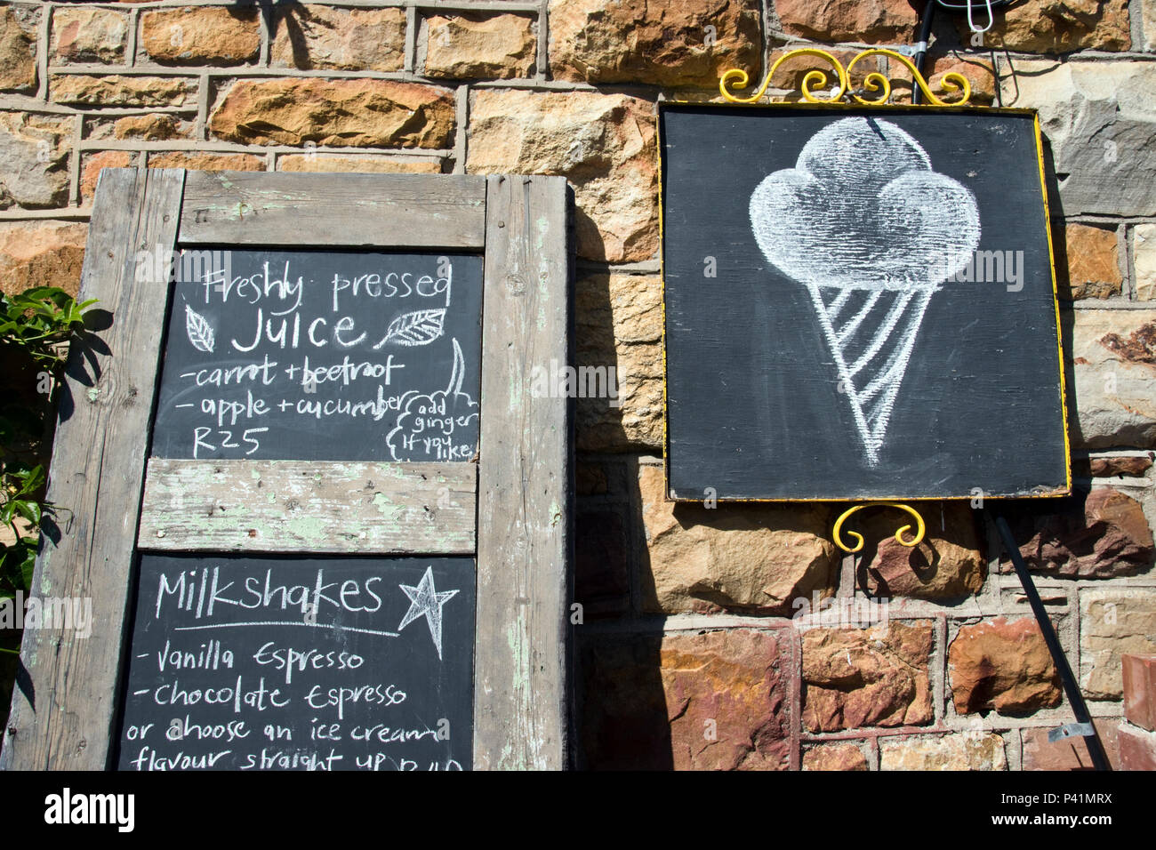 Chalk board menu at an ice cream shop at Boulders Beach (popular for ...
