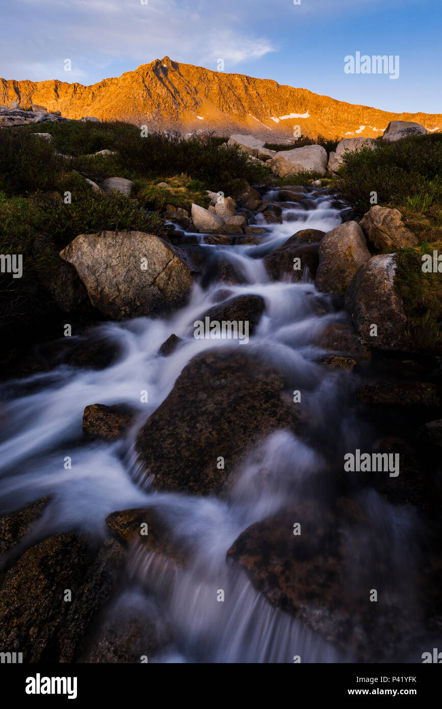 Last light on the back of the Four Gables with mountain stream just ...