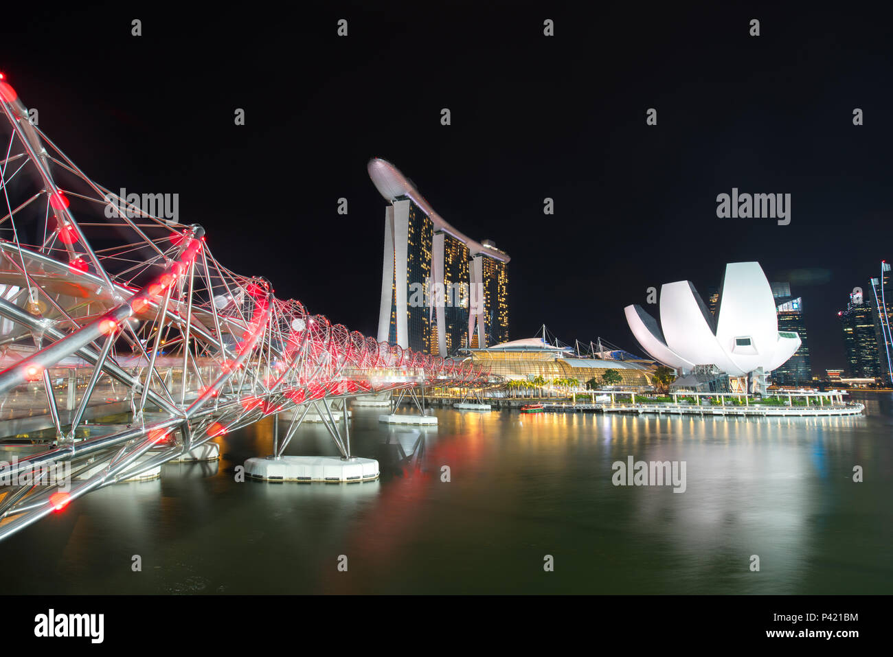 The Helix bridge with Marina Bay Sands in background, Singapore Stock ...