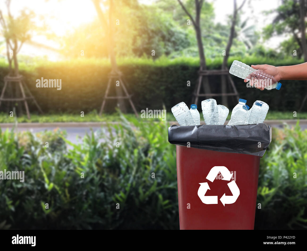 man hand putting plastic reuse for recycling concept environmental ...
