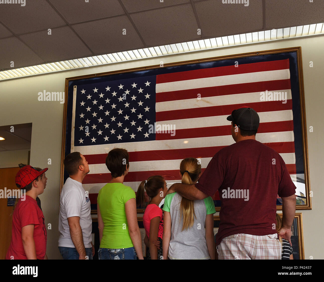 Master Sgt. Kelly K. Collett, broadcast manager, thrid from left, and ...