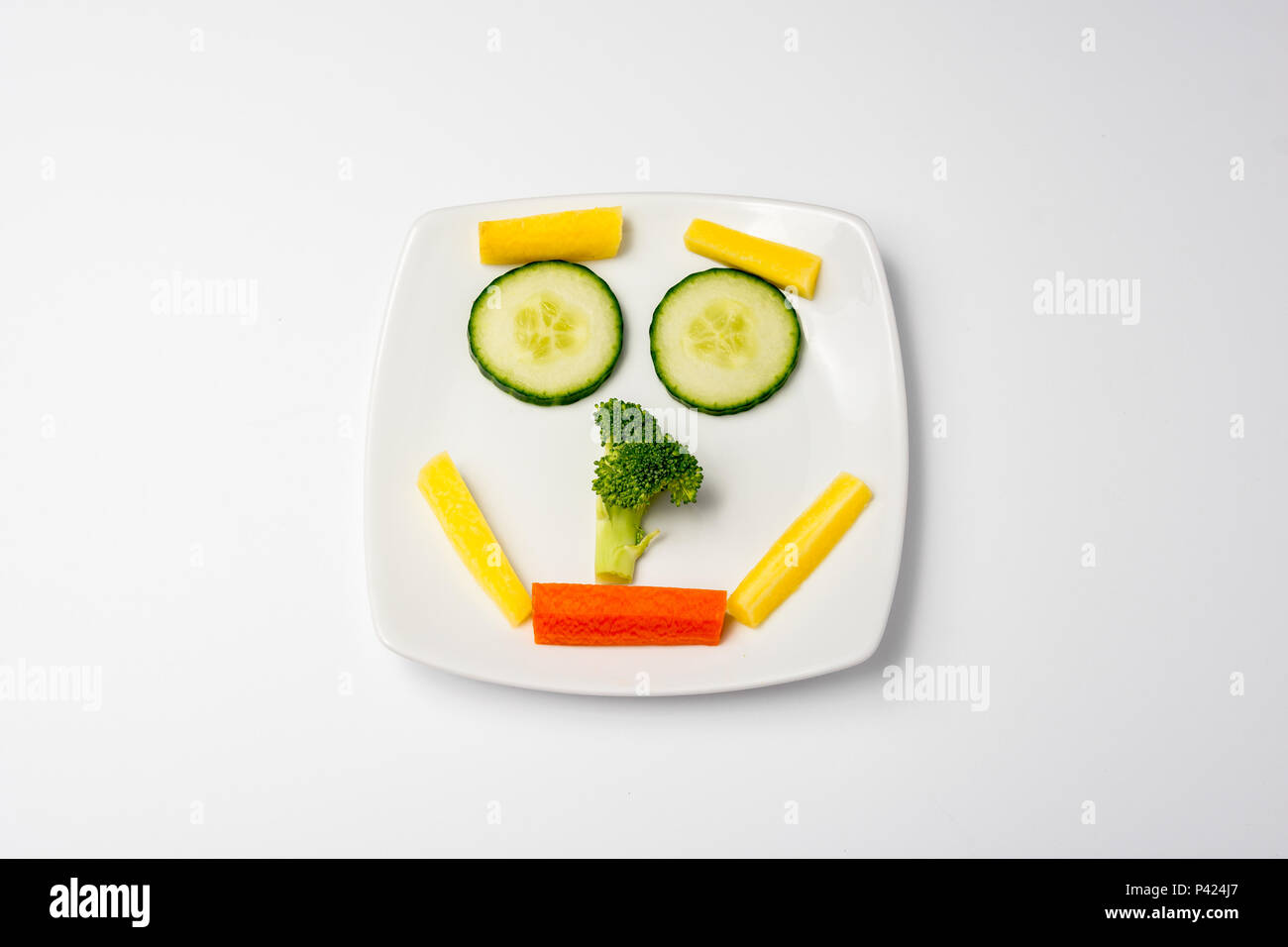 Food face smile hi-res stock photography and images - Alamy