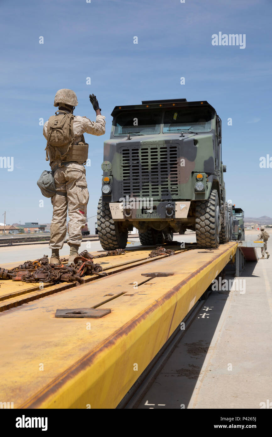 LCpl Josue Delmas of Combat Logistics Battalion 7 guides a vehicle onto ...