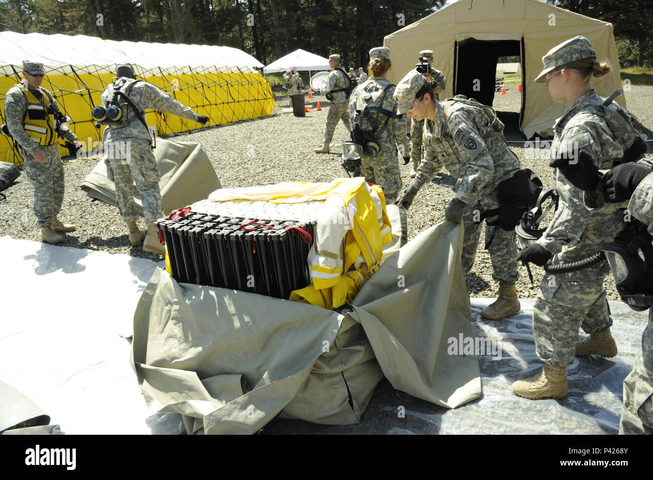 The CBRNE Enhanced Force Response Force Package (CERFP) members from ...