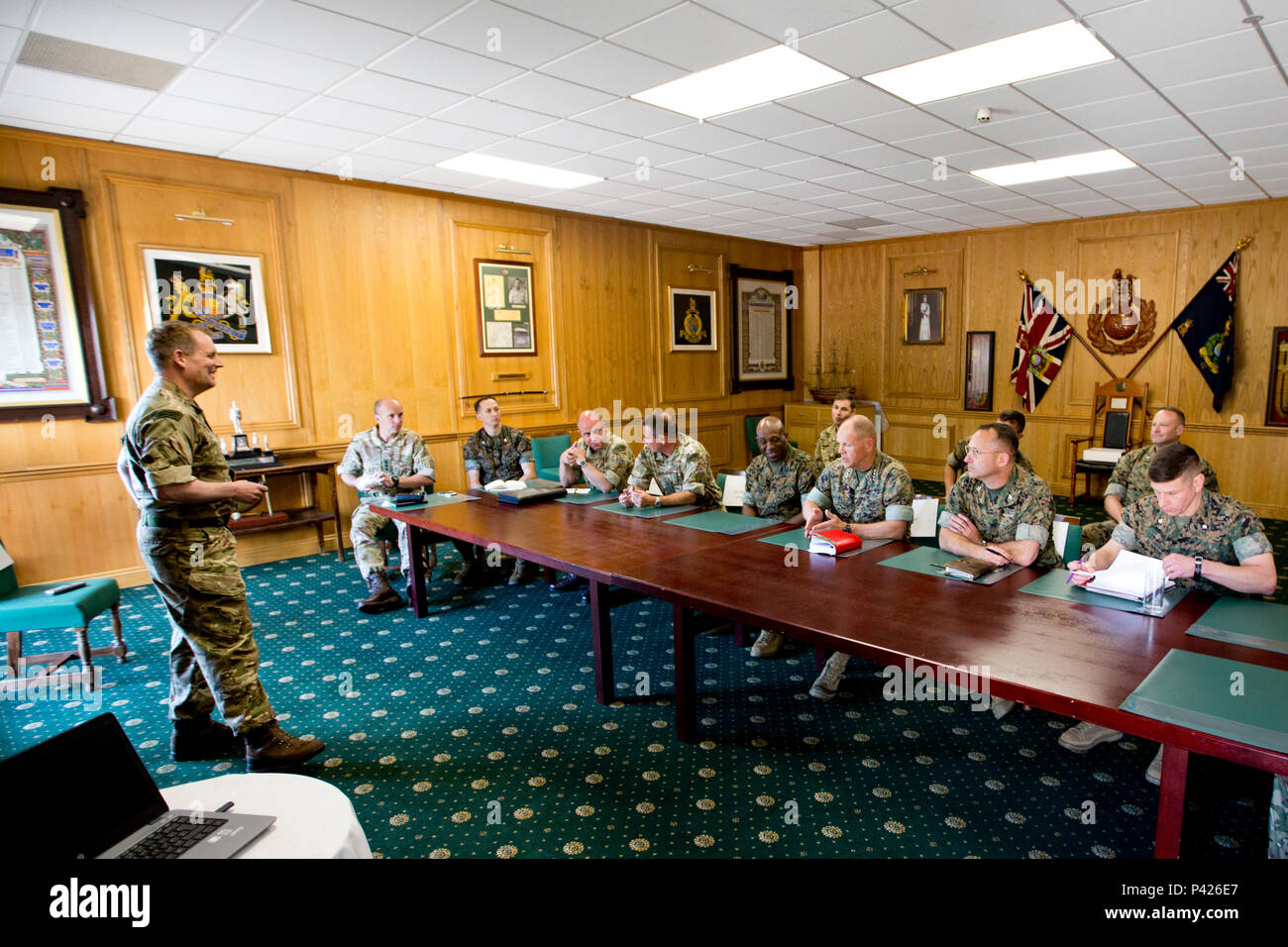 Commandant of the Marine Corps, Gen. Robert B. Neller, listens to a ...