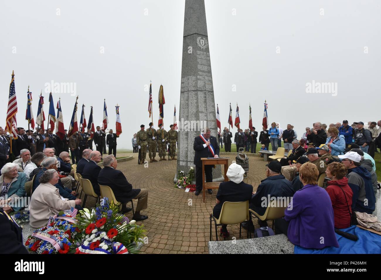 COLLEVILLE SUR MER, France - Soldiers, veterans and civilians circled ...