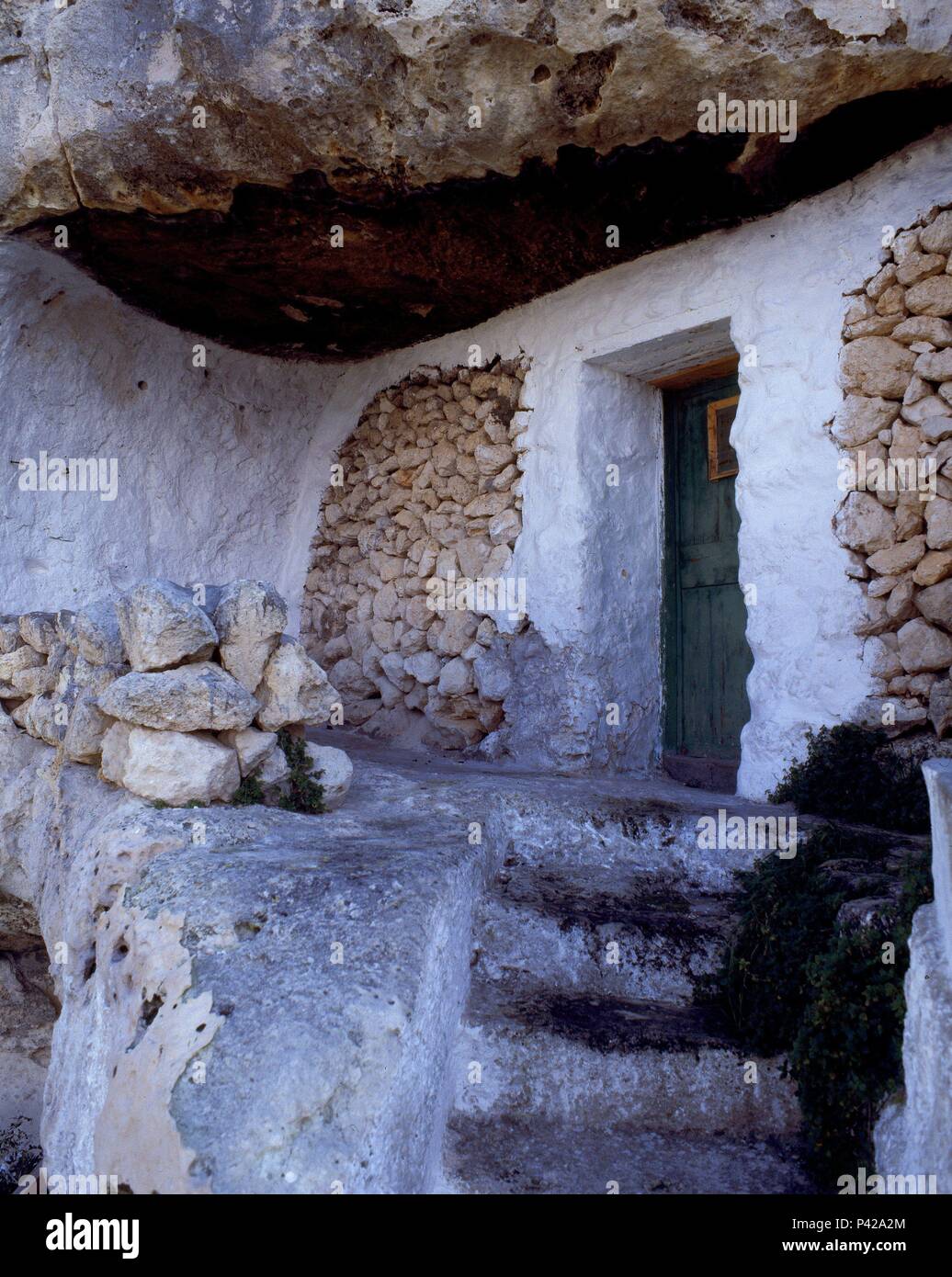 ENTRADA A CUEVAS PREHISTORICAS. Location: EXTERIOR, SPAIN Stock Photo ...