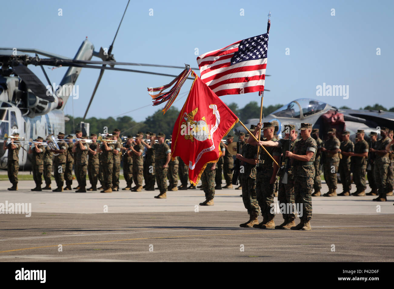 Marines with the 2nd Marine Aircraft Wing perform a pass-in-review for ...