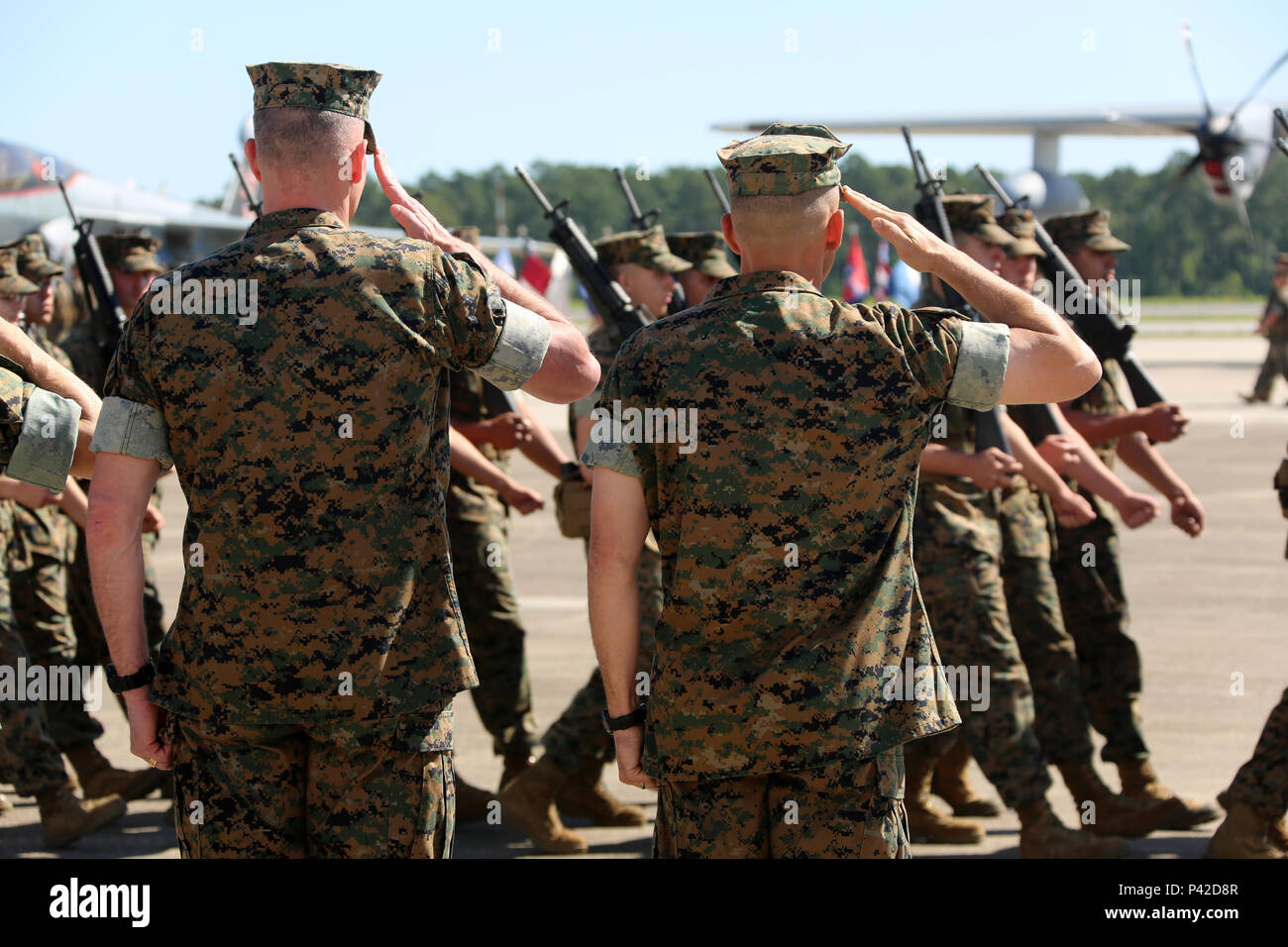 Maj. Gen. Gary L. Thomas, left, and Brig. Gen. Matthew G. Glavy salute ...