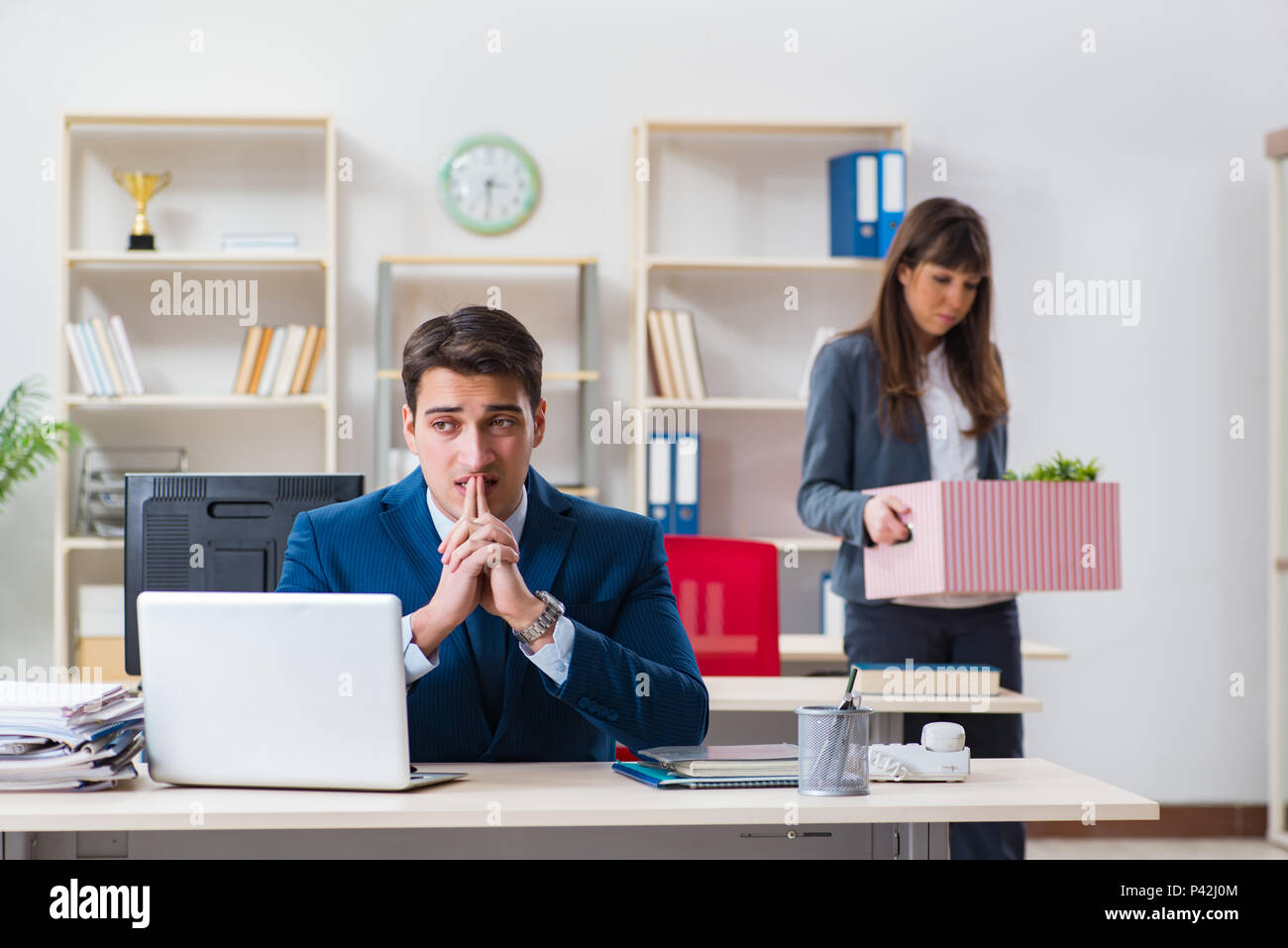 Person being fired from his work Stock Photo - Alamy