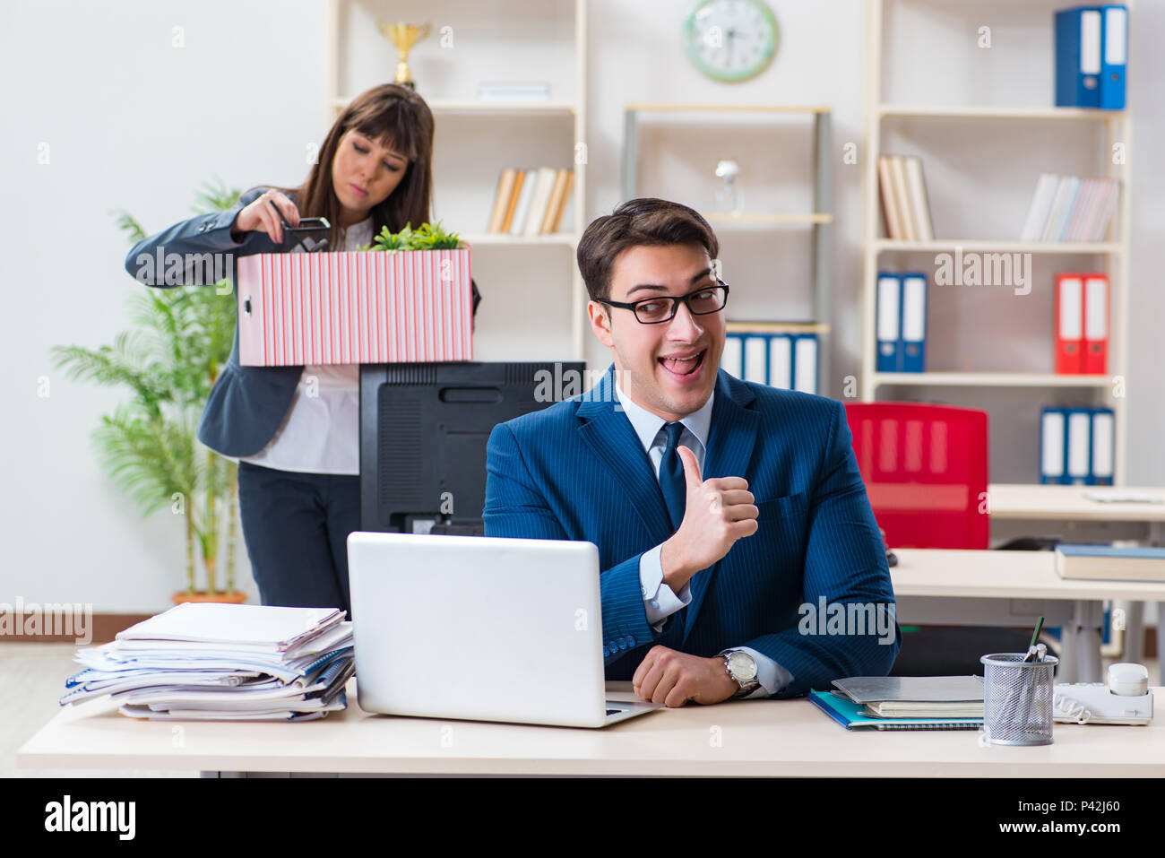 Person being fired from his work Stock Photo - Alamy