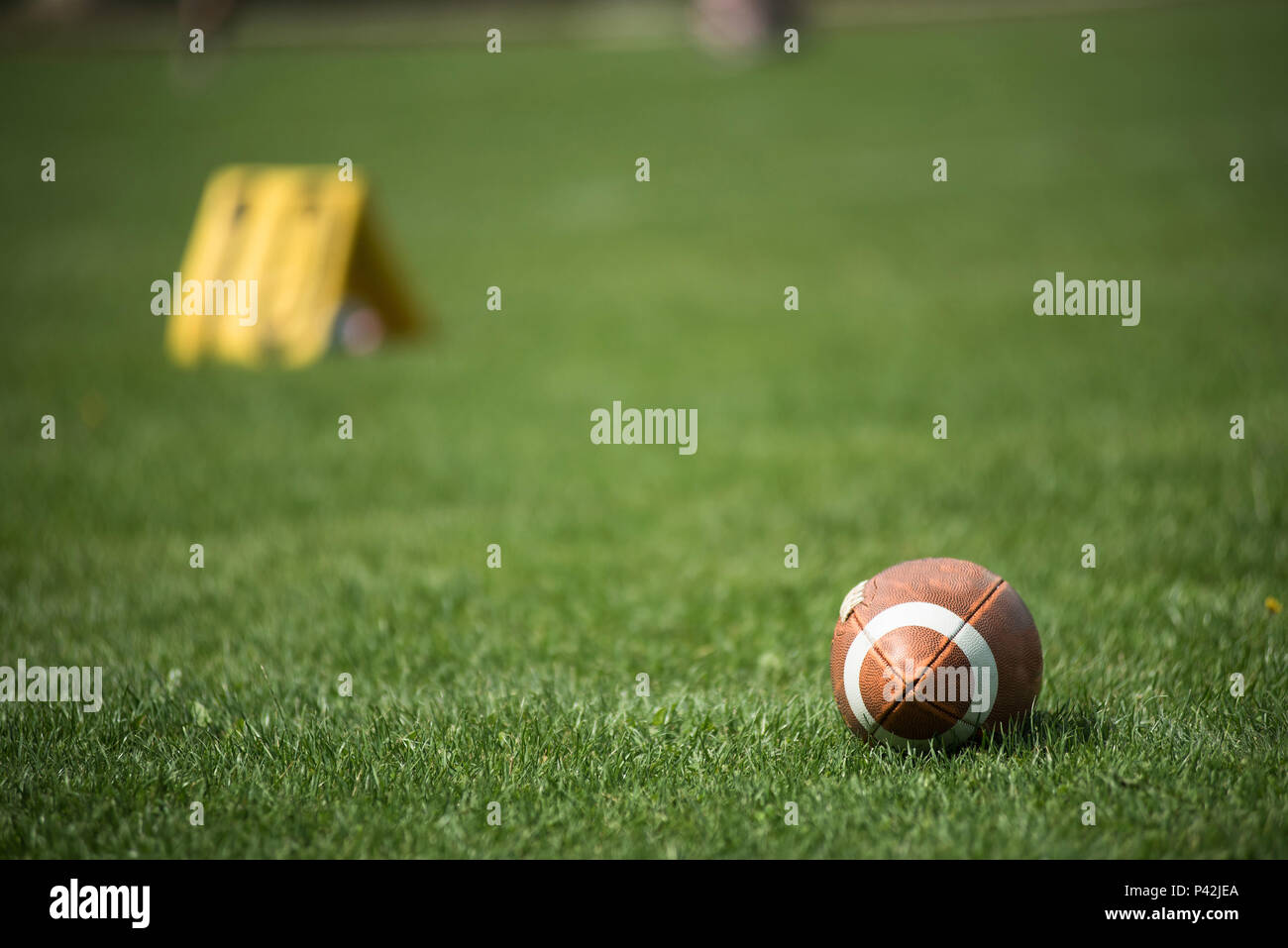 Boys playing football in yard hi-res stock photography and images - Alamy