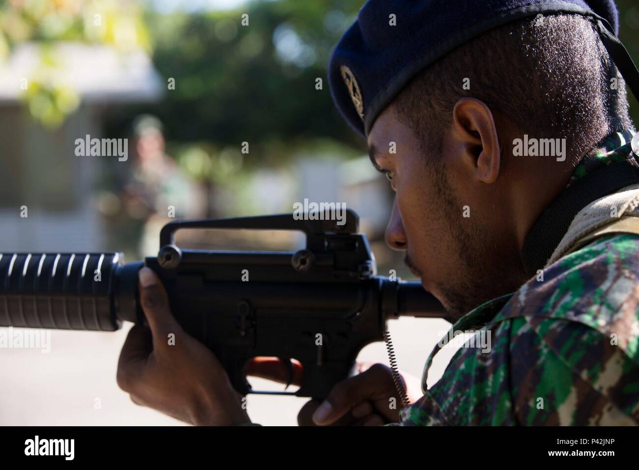 Timor-Leste Defense Force Fuzileiro 2nd Sgt. Nelson Belo provides ...