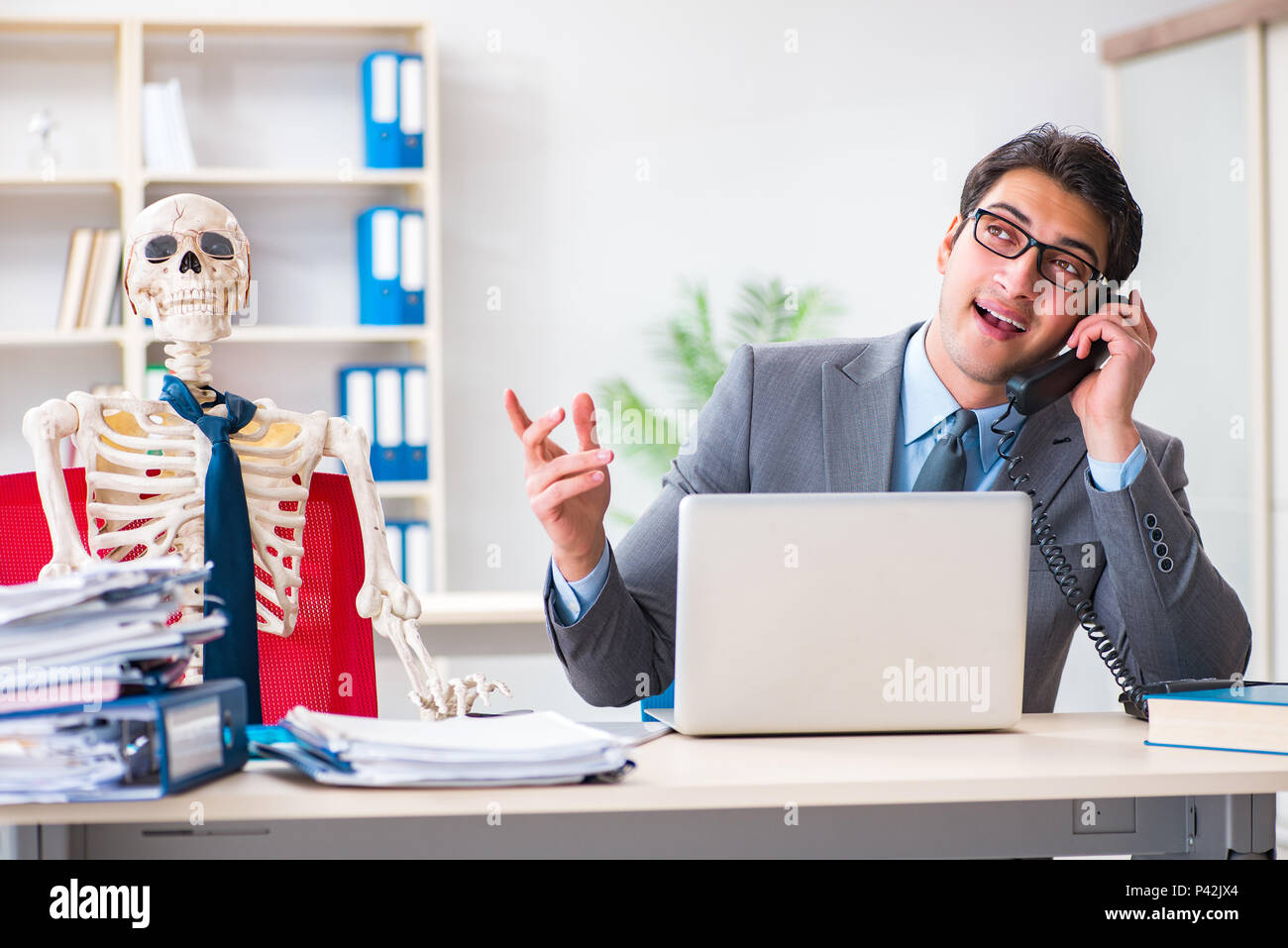 Man telephone skeleton hi-res stock photography and images - Alamy