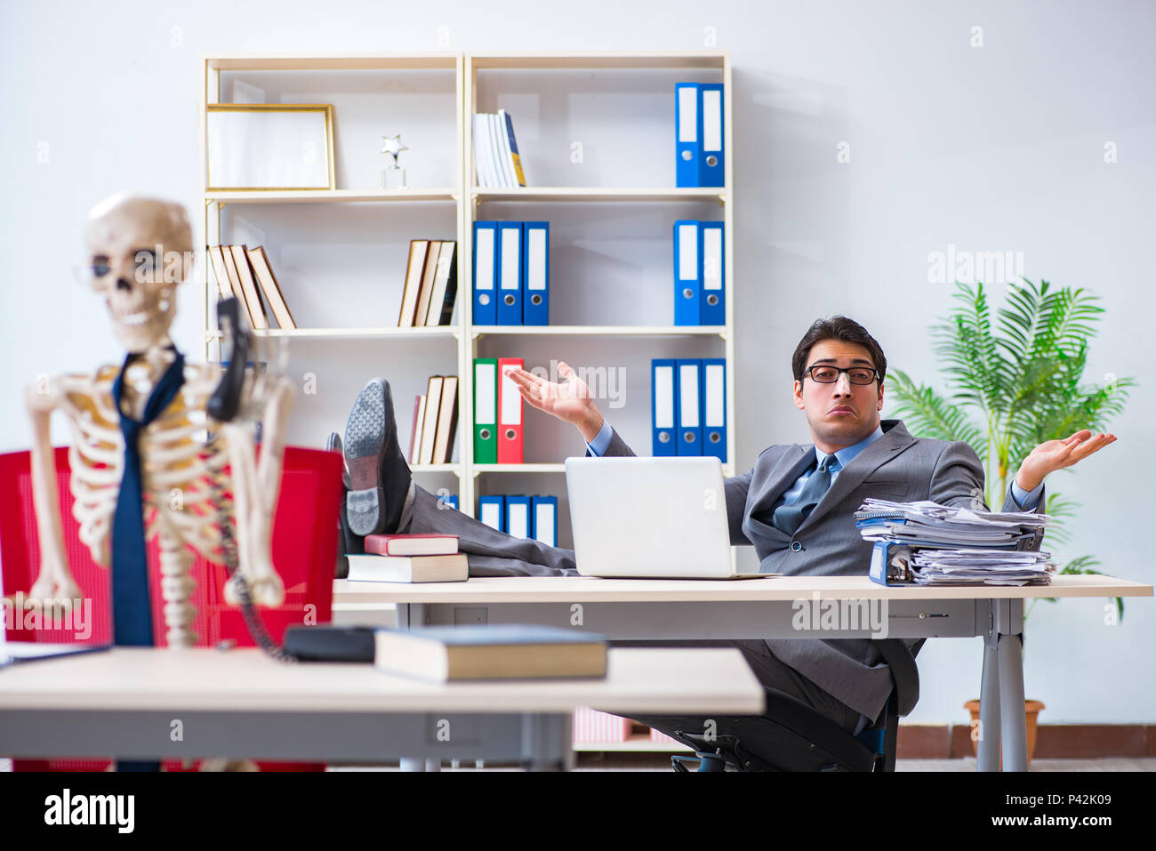 Dead office worker skeleton hi-res stock photography and images - Alamy
