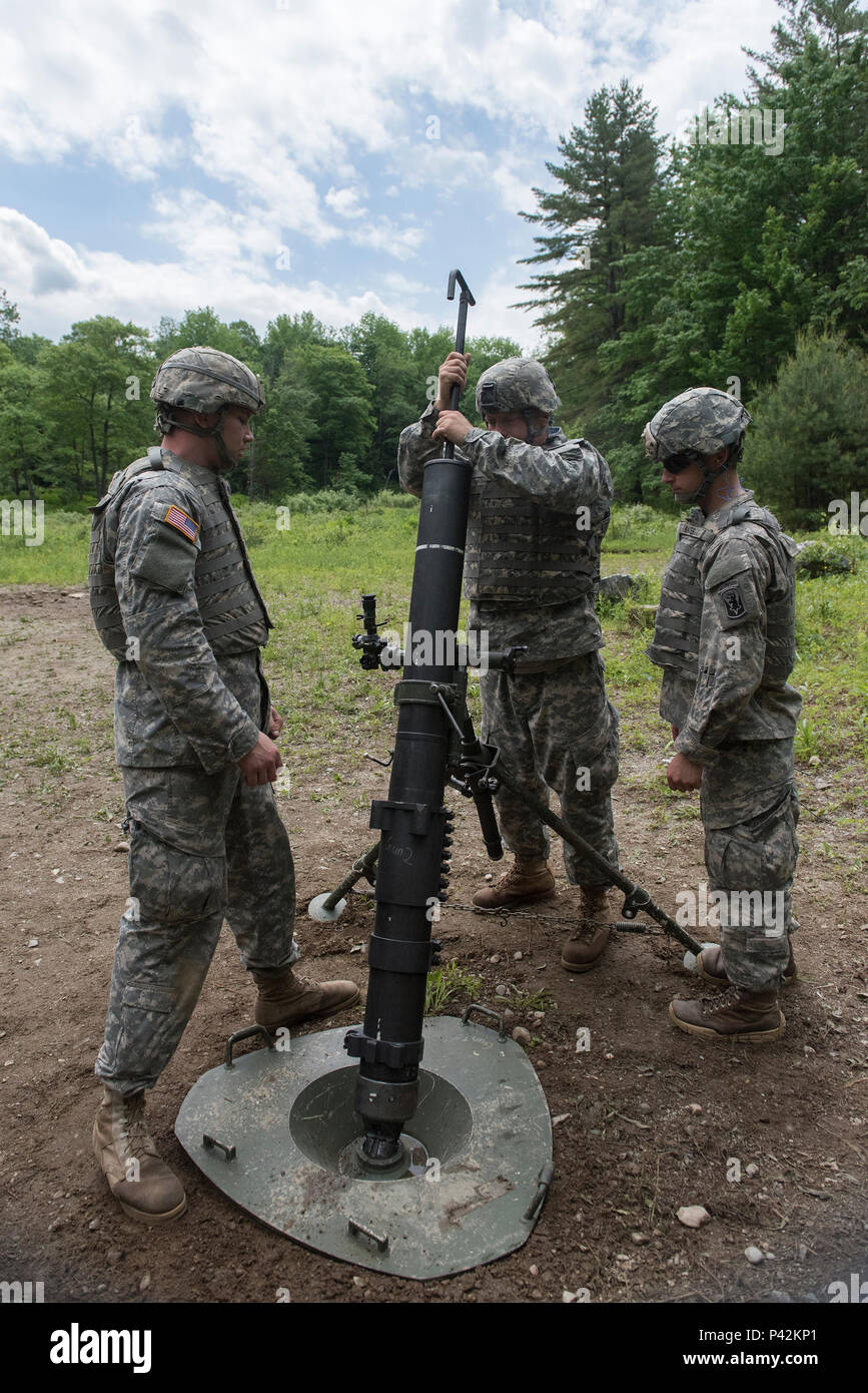 U.S. Army Spc. Craig Smith (left) and Spc. Walter Bates (right), watch ...
