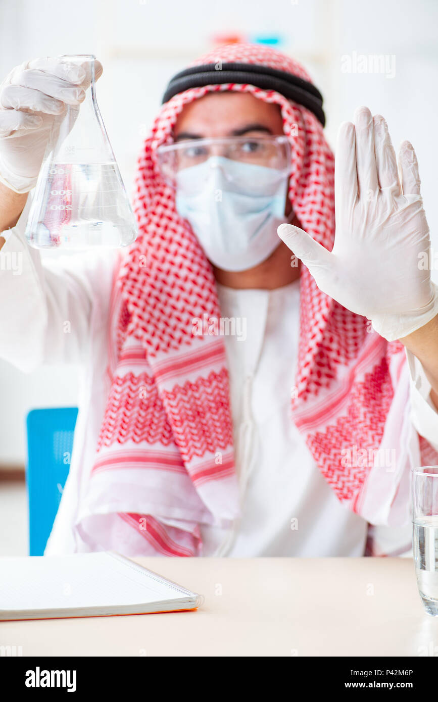 Arab chemist checking the quality of drinking water Stock Photo - Alamy