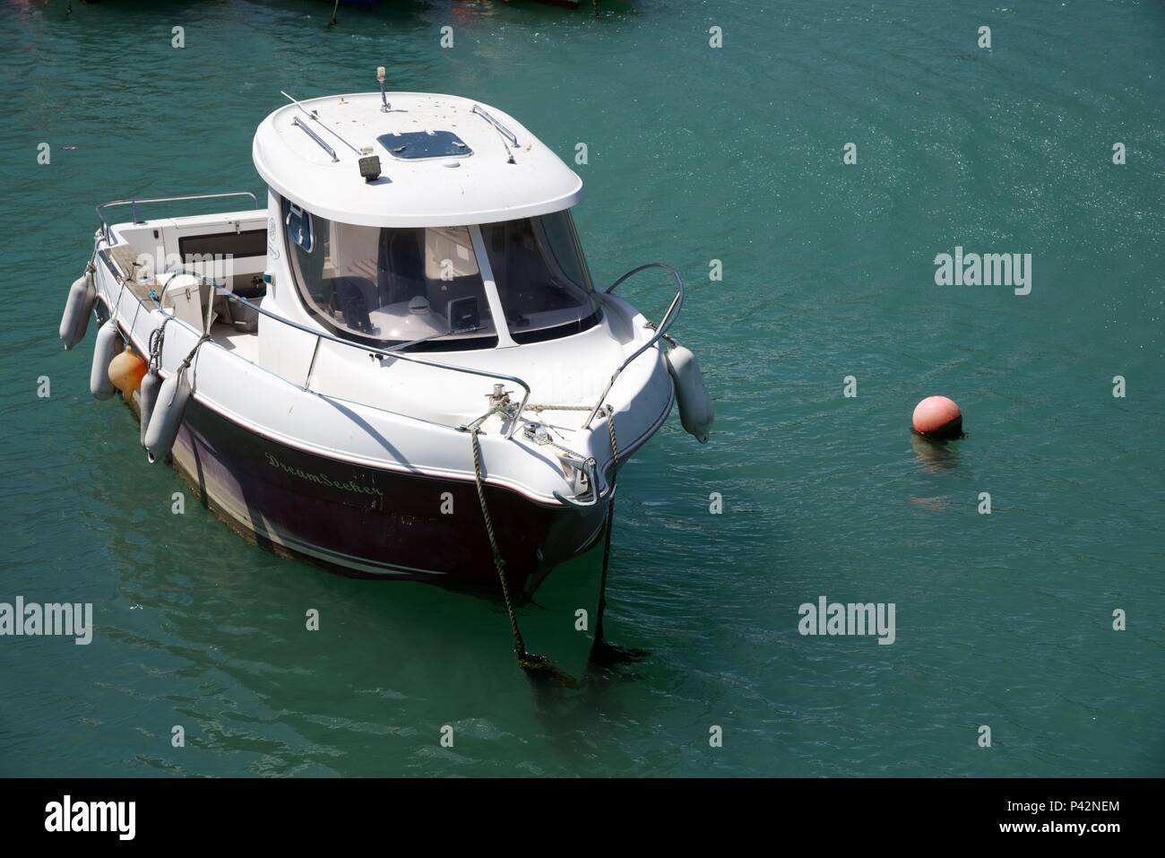 Small fishing boat: a small sea-going craft moored in Folkestone ...