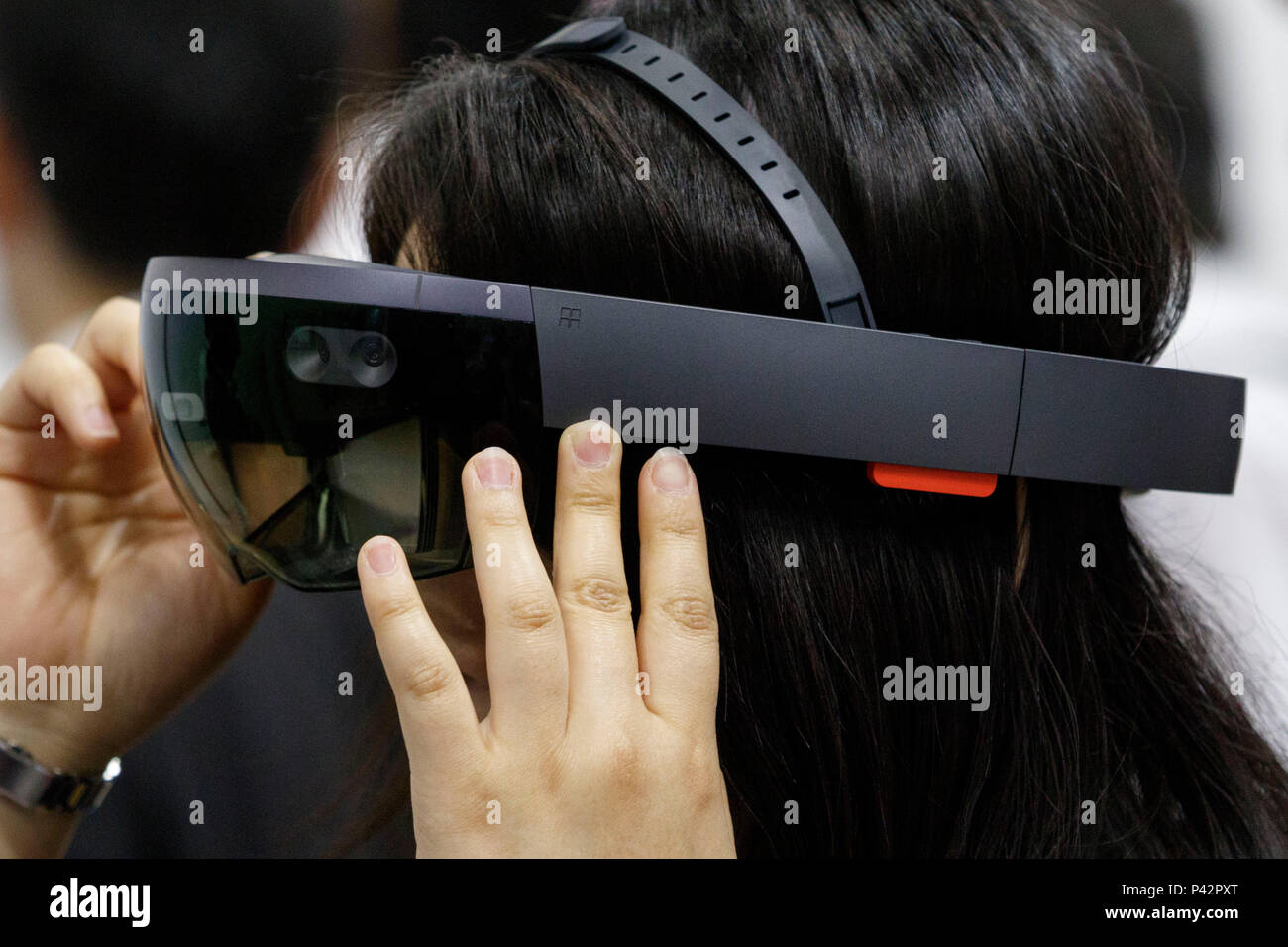 Tokyo, Japan. 20th Jun, 2018. A visitor experiments the Augmented ...