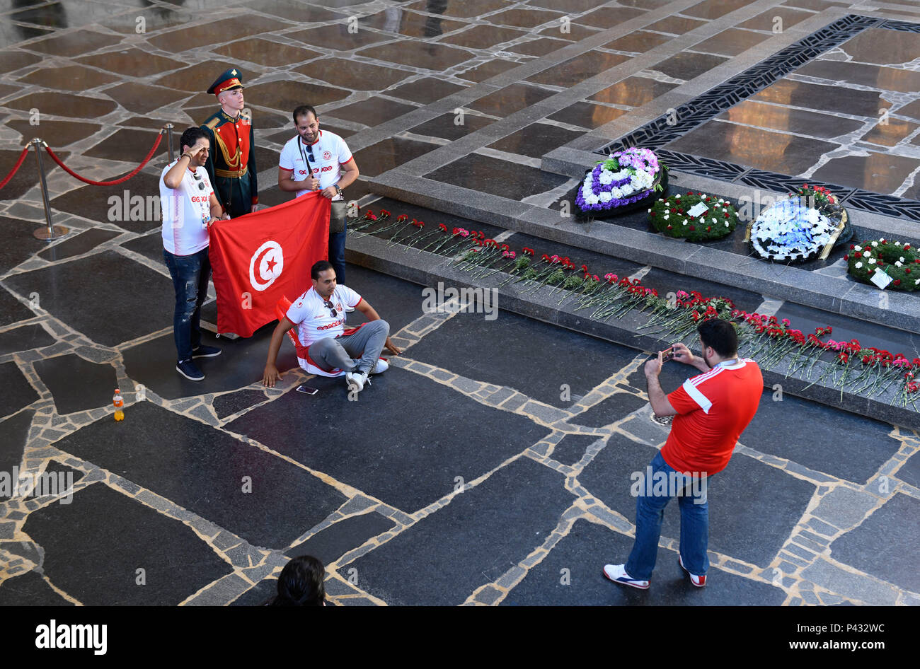 Volgograd, Russia. 19th June, 2018. Tunisian soccer fans take pictures ...