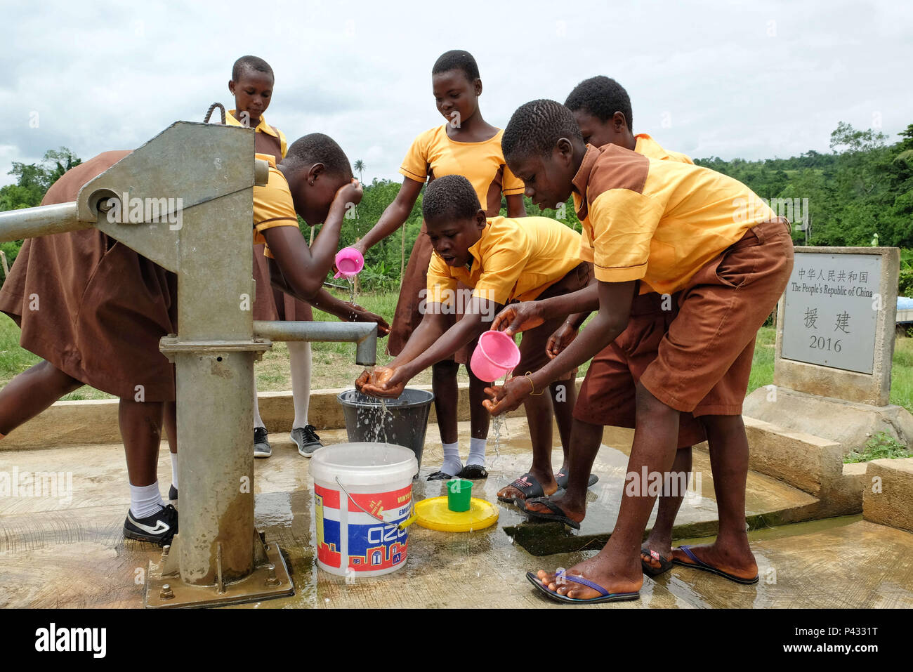 Eastern Region, Ghana. 20th June, 2018. Children fetch water from a ...