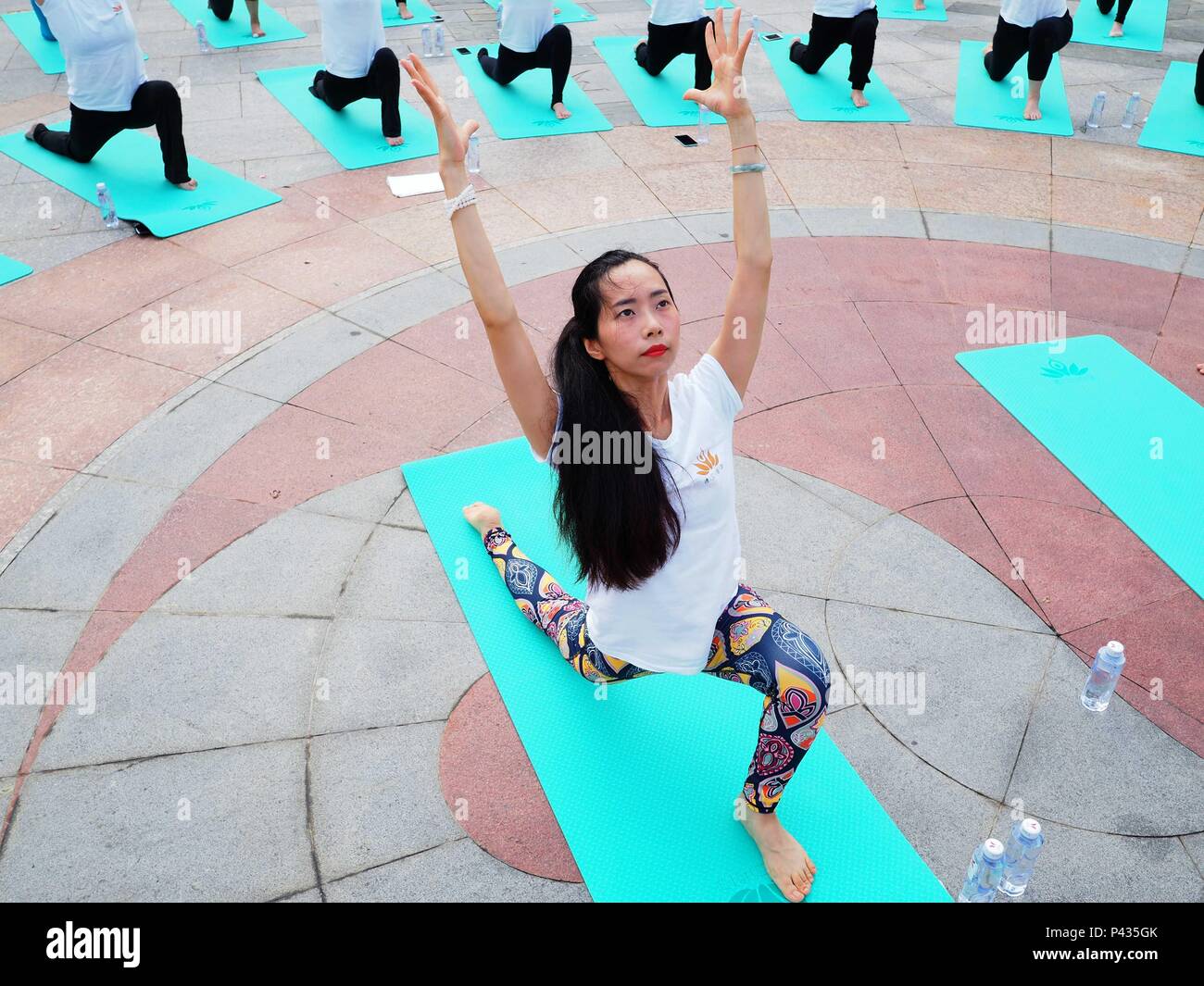 Huai'an, CHINA. 21st June 2018.People practice yoga at Bochi Hill Park ...