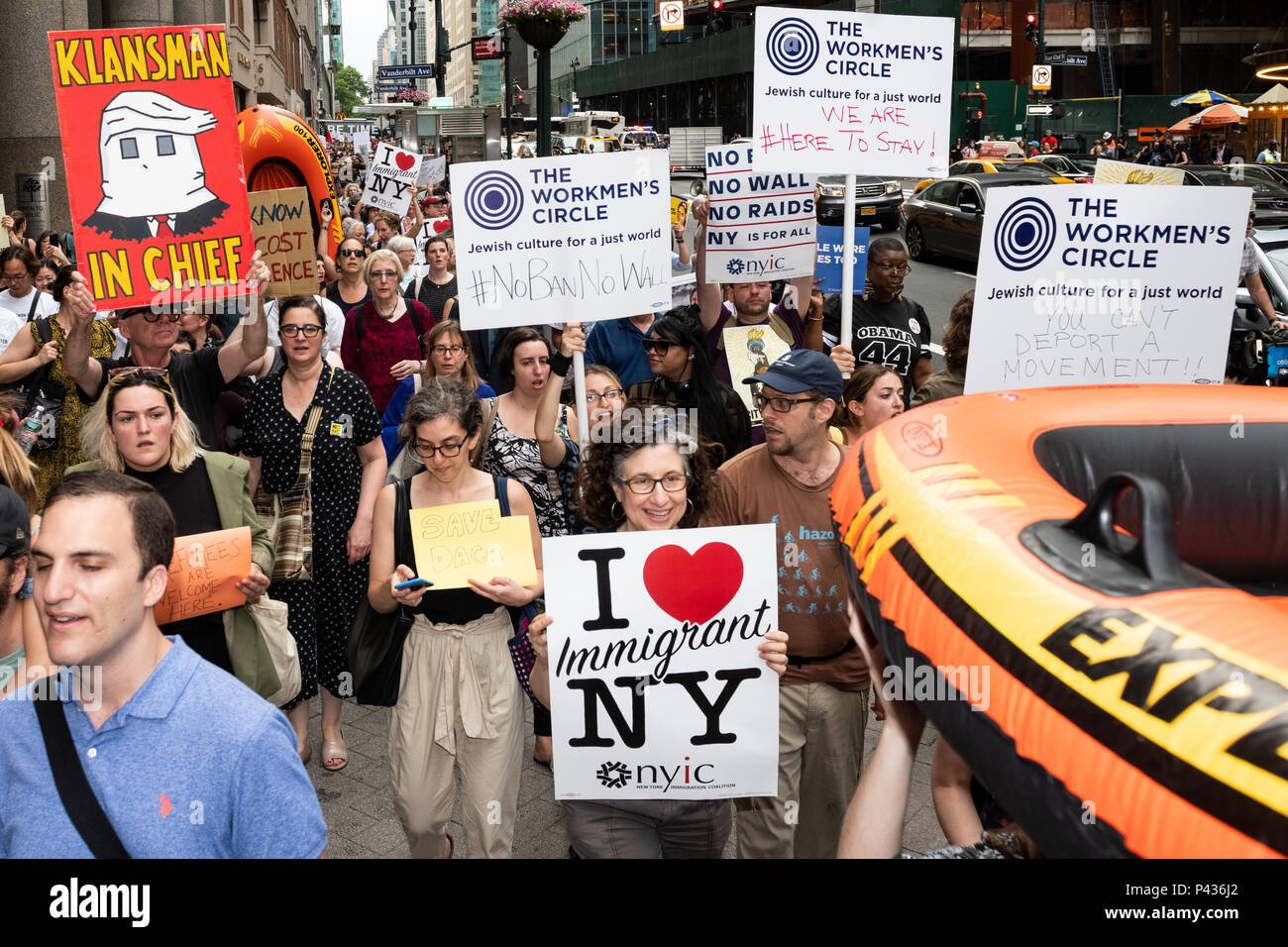 Participants seen holding placards during the march. Thousands took ...