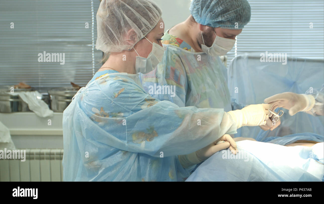 Operating room cut sew up hi-res stock photography and images - Alamy