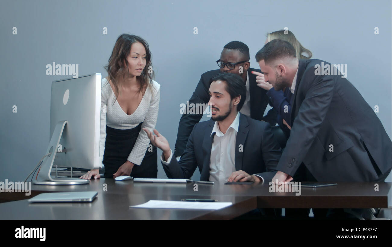Group of multiracial business people around the conference table ...