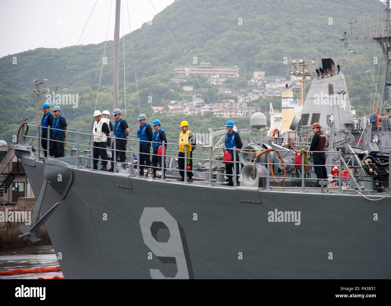 160604-N-NY430-145 SASEBO, Japan (June 4, 2016)– Sailors man the rails ...
