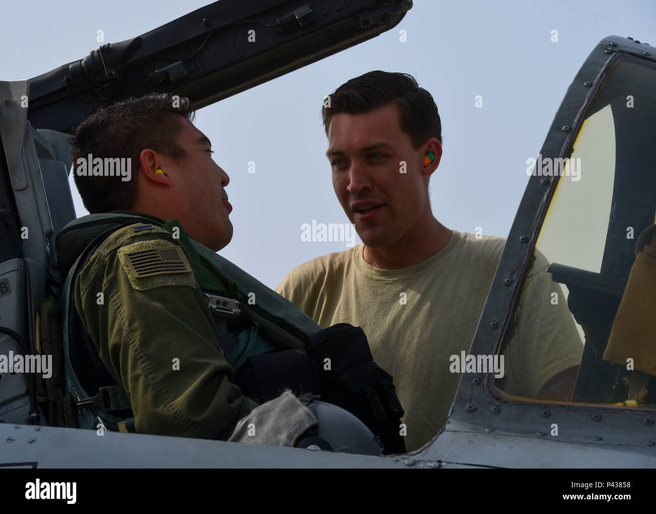 First Lt. Shannon Smith, 25th Fighter Squadron pilot, speaks with ...