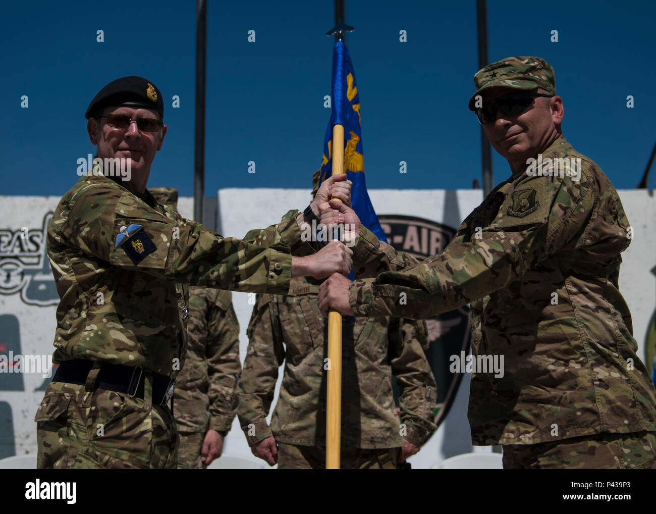 Brig. Gen. David Hicks, 438th Air Expeditionary Wing commander, accepts ...