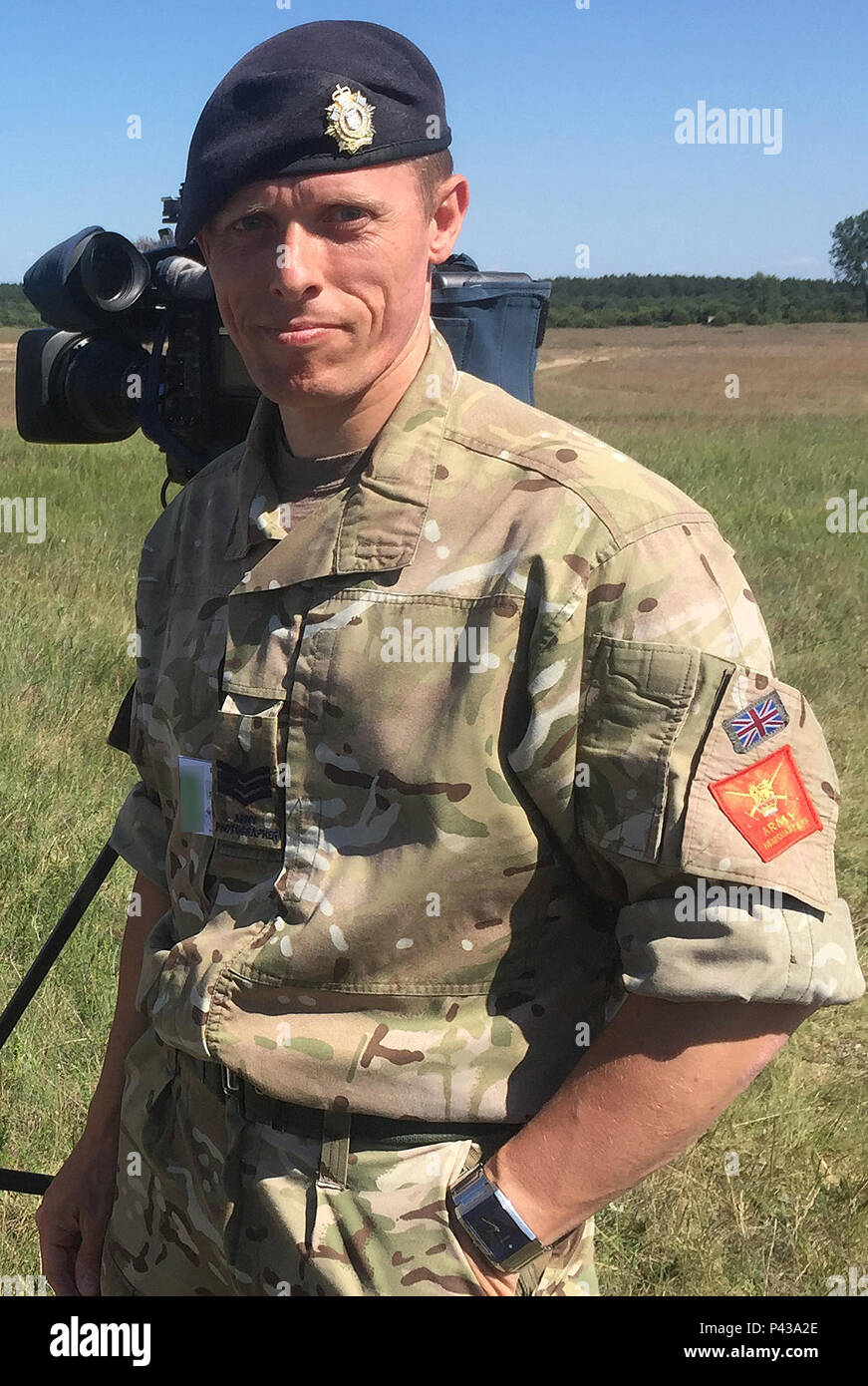 Sgt. Gary Kendall, a British Army Photographer with the Army News Team ...