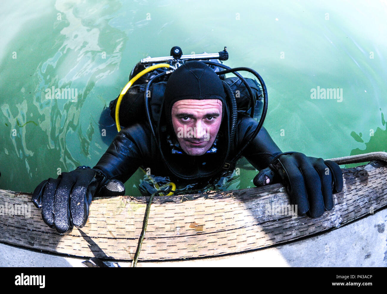 Spc. Riccardo Micheletto, an Army diver assigned to 569th Engineer Dive ...